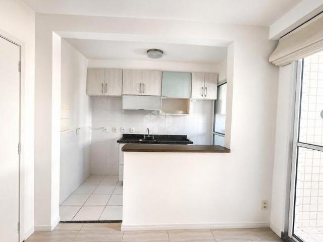 Apartamento 2 dormitórios 50m2, semimobiliado, com sacada, vaga e elevador no ba