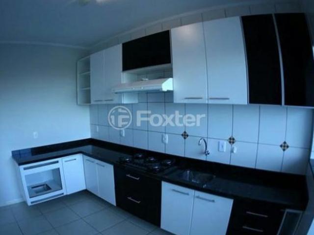 Apartamento, 2 dormitórios, 66 m², em Centro