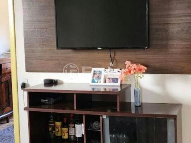Apartamento, 2 dormitórios, 72.59 m², em Centro