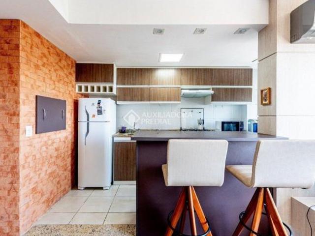 Apartamento 2 dorms 1 suíte 2 vagas 1 coberta, e vista para o Rio Guaiba
