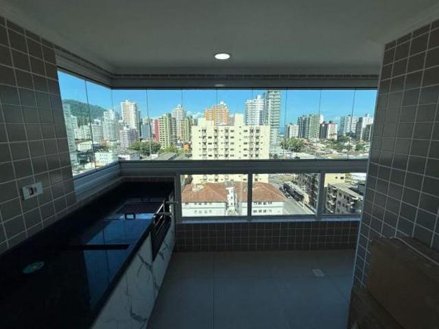Apartamento 2 dorms 1 suíte com vista mar no Canto do Forte – 68,32 m², varanda gourmet e 1 vaga