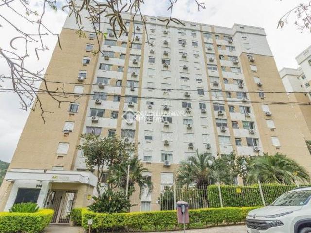 Apartamento 2 quartos com garagem em andar alto no bairro Jardim Carvalho