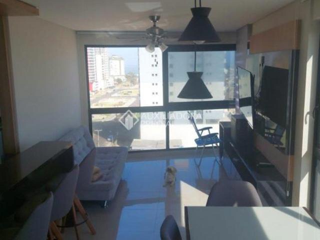 Apartamento 2 quartos com suíte beira da praia em Tramandaí