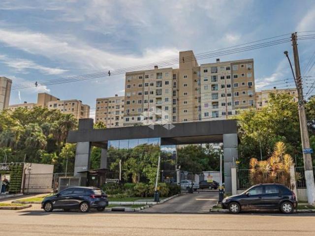 Apartamento 2 quartos. Sacada com Churrasqueira e com vaga a venda no Santa Fé em Porto alegre