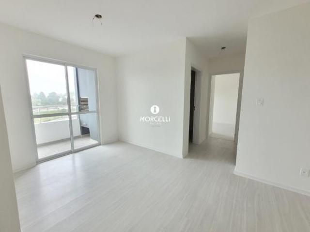 Apartamento 2Dorm com sacada churrasqueira e garagem