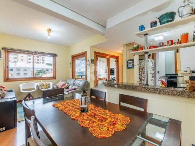 Apartamento 3 dormitórios no Petrópolis semimobiliado 1 suíte 1 vaga com sacada