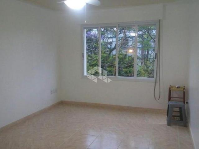 Apartamento 3 dormitórios com garagem no Menino Deus