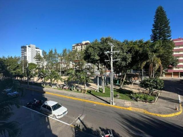 Apartamento 3 dormitórios, sendo 1 suíte, banho social + dependência, mobiliado com vista para praça