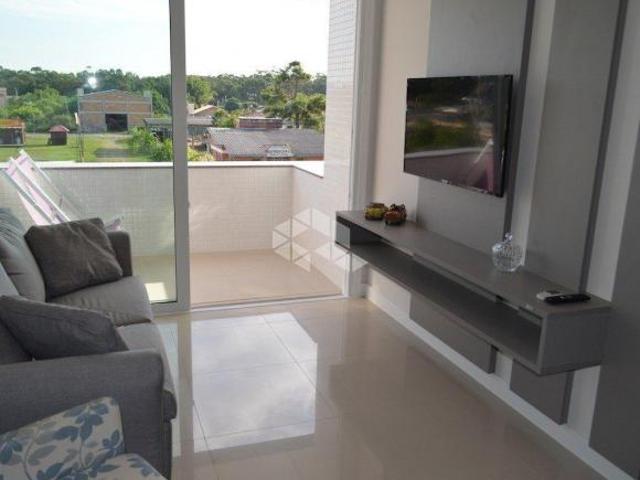 Apartamento 3 dormitórios, sendo 1 suíte, de frente para Av. Central, mobiliado e climatizado em Atl