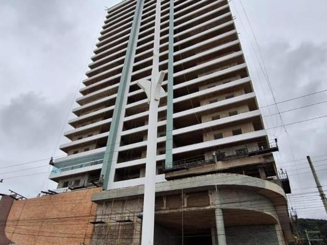 Apartamento 3 dormitórios sendo 1 suíte + lavabo frente mar em Mongaguá