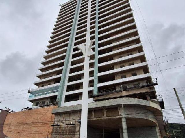 Apartamento 3 dormitórios sendo 1 suíte + lavabo frente mar em Mongaguá