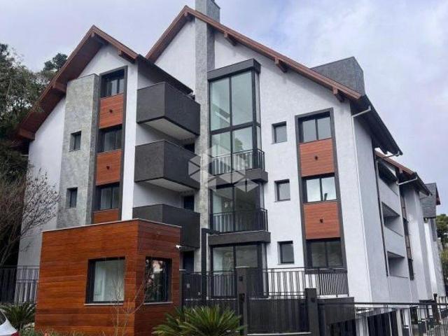 Apartamento 3 dormitórios, 90,09m² privativos, 2 vagas de garagem, no Centro de Gramado