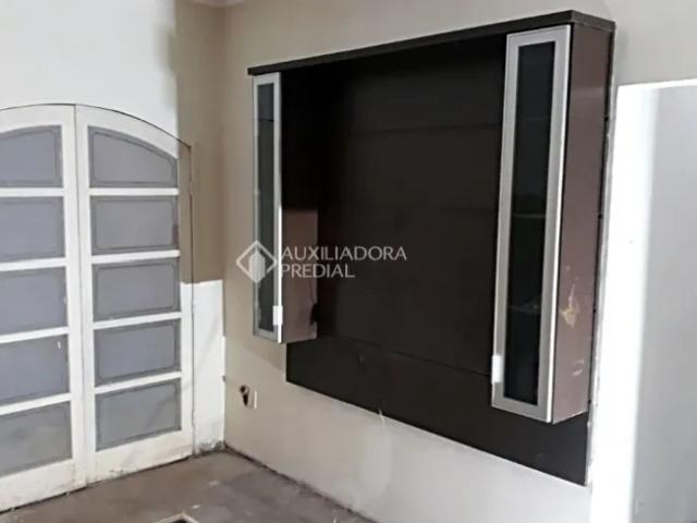 Apartamento térreo de dois dormitórios com pátio