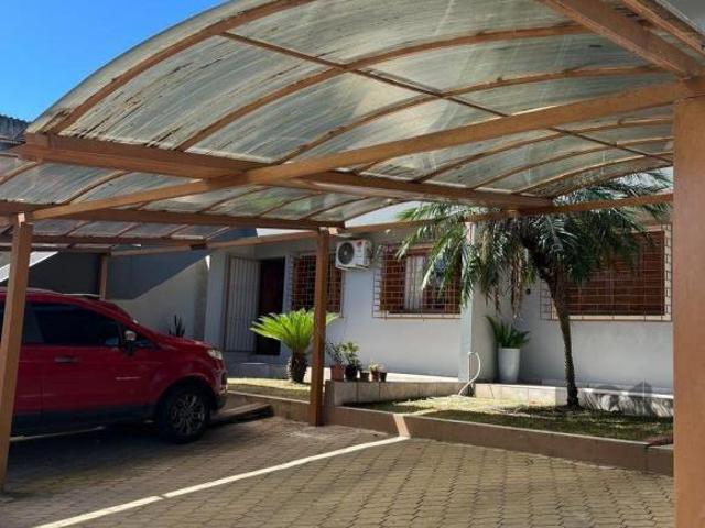 Apartamento térreo, 2 dormitórios, 1 suíte, 2 vagas, Bairro Vista Alegre