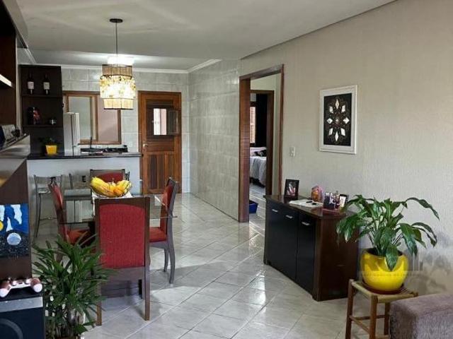 Apartamento térreo, 2 dormitórios, 1 suíte, 2 vagas, Bairro Vista Alegre