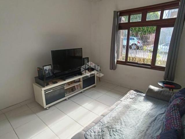 Apartamento térreo, 2 dormitórios, amplo, com 64 m², bem localizado