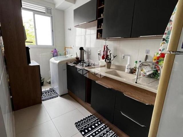 Apartamento térreo 2 dormitórios com pátio e churrasqueira à venda em Novo Hamburgo