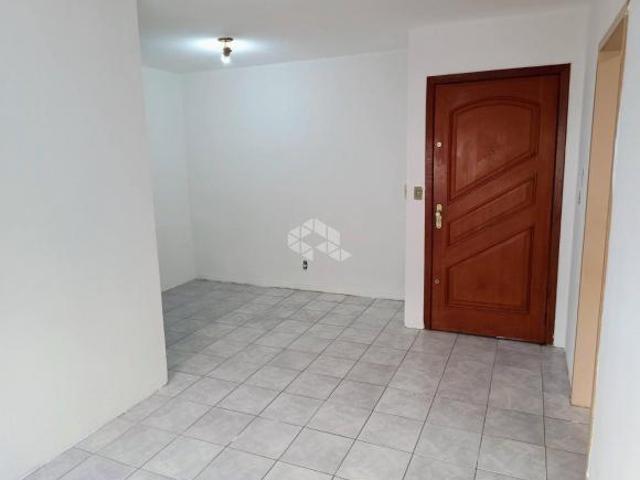 Apartamento terreo, 2 dormitórios, living 2 ambientes, cozinha, area de serviço, Bairro Vila Nova, P