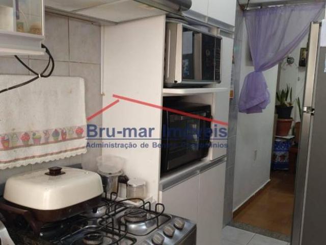 Apartamento térreo 2 dormitórios, Macuco, 51m², reformado, vaga para moto