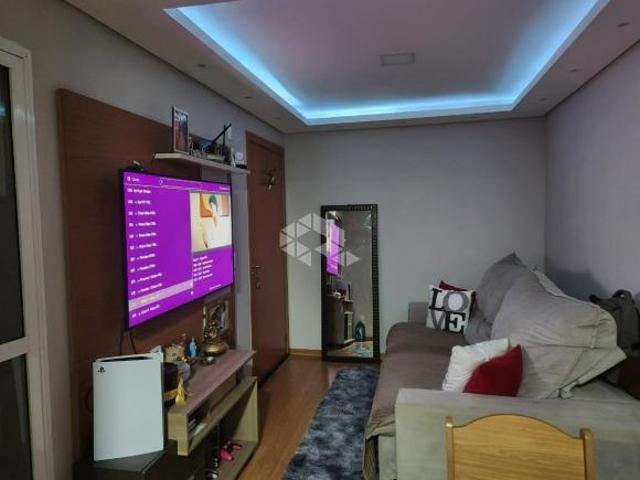 Apartamento Térreo com pátio 02 dormitórios, vaga escriturada em Viamão