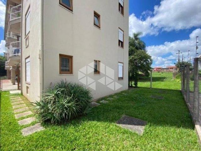 Apartamento térreo com 3 dormitórios e pátio privativo, no Bairro Universitário!