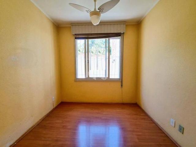 Apartamento térreo de 1 dormitório com pátio e churrasqueira no Bairro Tristeza próximo ao Zaffari