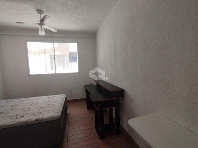 Apartamento térreo de 2 quartos e 1 vaga no Sarandi