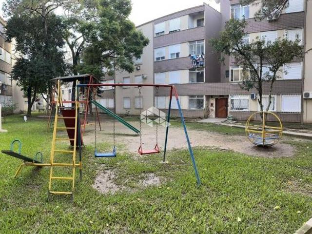 Apartamento térreo em condomínio fechado no bairro Cavalhada