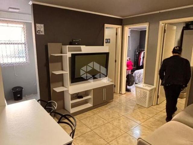 Apartamento térreo semi mobiliado de 2 quartos e garagem no Partenon
