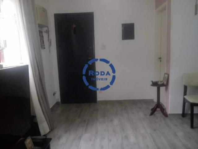 Apartamento térreo próximo da praia a venda em Santos, localizado no bairro do Boqueirão