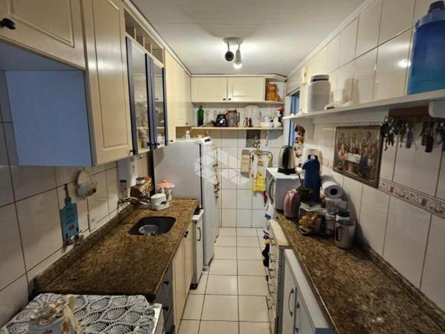 Apartamento térreo/garden de 2 dormitórios com garagem no Menino Deus próximo ao Zaffari