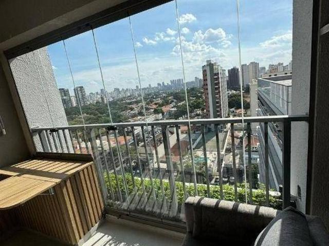 Apartamento totalmente mobiliado e decorado com 1 dormitório e varanda à venda, 31 m² por R$ 750.000