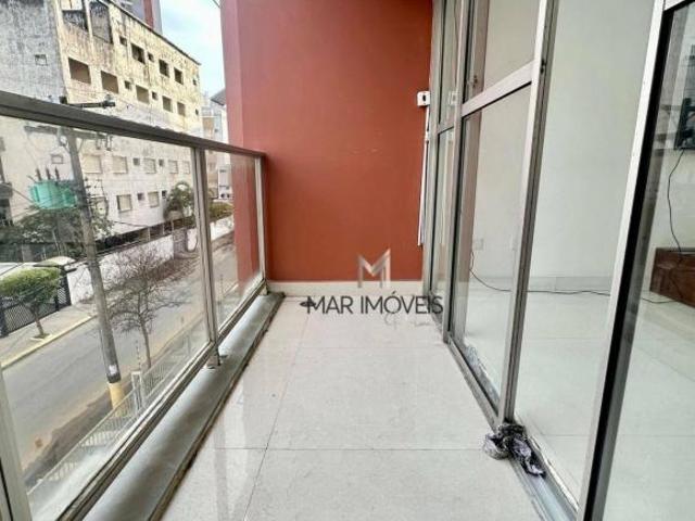 Apartamento totalmente reformado á venda na Praia da Enseada/Mar Imóveis Prime