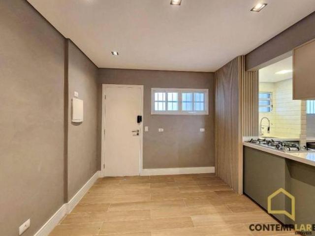 Apartamento totalmente reformado porteira fechada com 2 dormitórios à venda, 52 m² por R$ 700.000