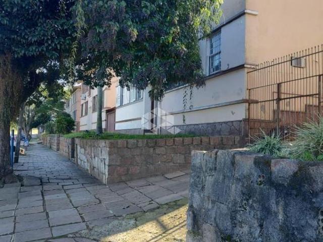 Apartamento três dormitórios e garagem no Higienópolis/IAPI