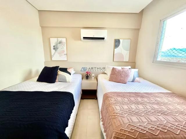 Apartamento á venda em Praia Grande com churrasqueira a carvão e mobiliado