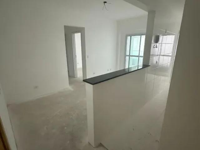 Apartamento à venda em Praia Grande SP, Caiçara: 2 quartos, 1 suíte, 1 sala, 2 banheiros, 77m². Venh