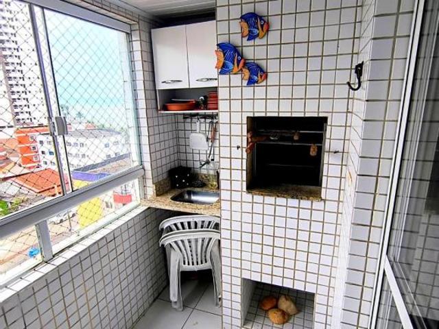 Apartamento vista mar com varanda gourmet com churrasqueira á carvão