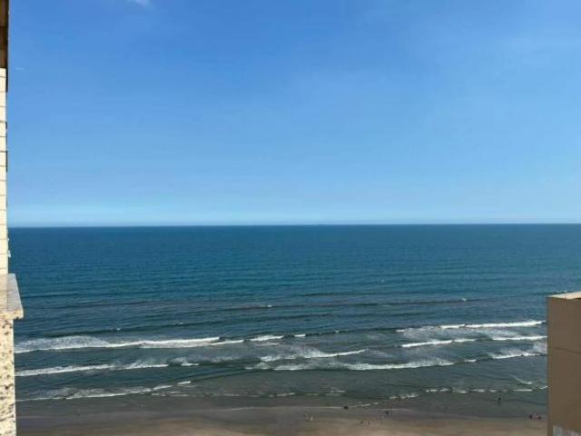 Apartamento 2 Suítes na Praia Grande Caiçara com Varanda Gourmet e Vista para o Mar