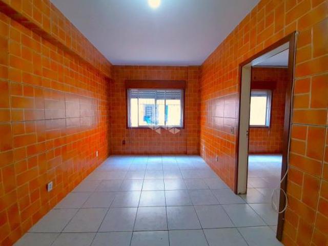 Apartamento a metros do Zaffari da Lima e Silva da UFRGS e do Parque da Redenção com box escriturado