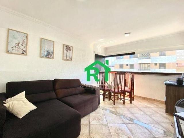 Apartamento à beira mar com 2 dormitórios, 1 vaga, Praia da Enseada Guarujá/SP