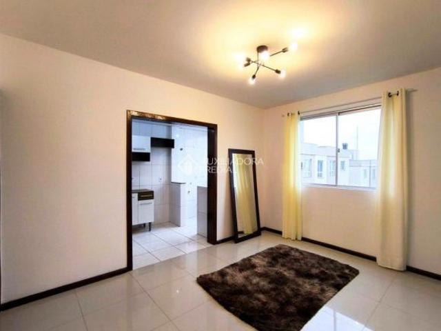 Apartamento reformado de 2 dormitórios com vaga no bairro Olaria, Canoas