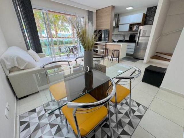 Apartamento a venda na Enseada com 2 suítes, 2 vagas e lazer com vi