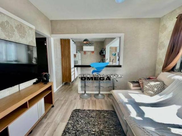 Apartamento à venda na praia da Enseada no Guarujá I Omega Imoveis