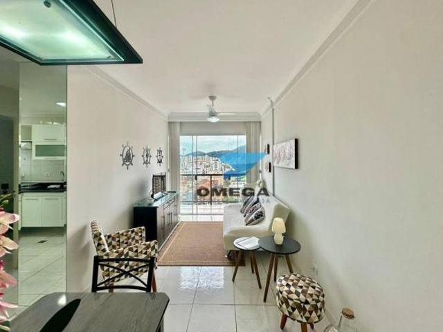 Apartamento à venda na praia da Enseada no Guarujá I Omega Imoveis