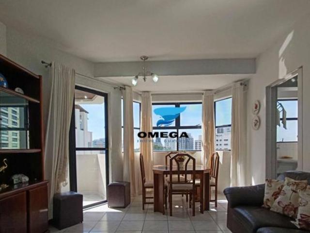 Apartamento à venda na praia daas Asúrias no Guarujá I Omega Imoveis