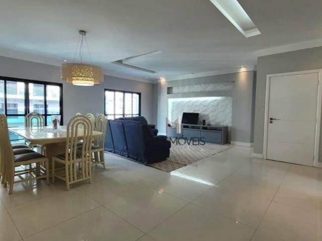 Apartamento à venda na praia das Pitangueiras em Guarujá Mar Imóveis Prime