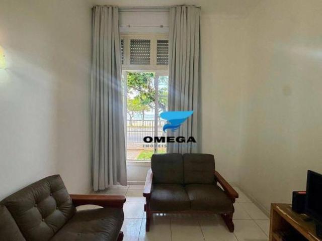 Apartamento à venda na praia das Pitangueiras no Guarujá I Omega Imoveis