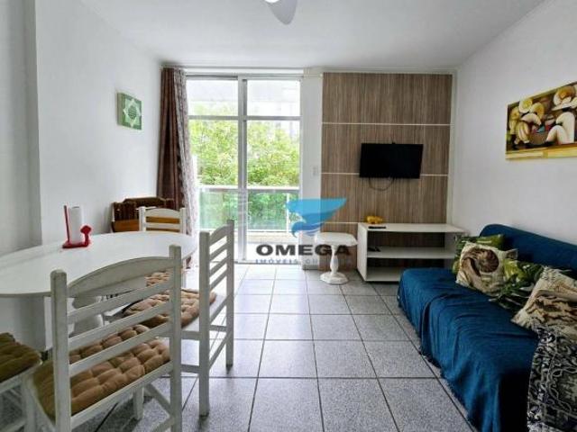 Apartamento à venda na praia das Pitangueiras no Guarujá I Omega Imoveis