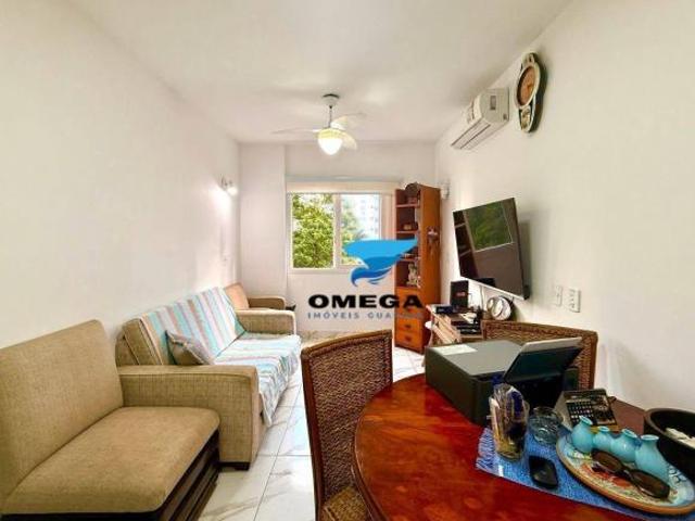 Apartamento à venda na praia das Pitangueiras no Guarujá I Omega Imoveis